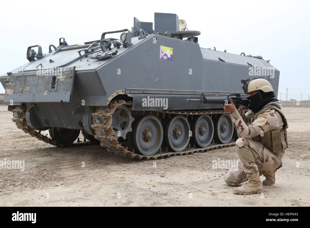 An Iraqi soldier enrolled in the Junior Leaders Course, pulls security ...