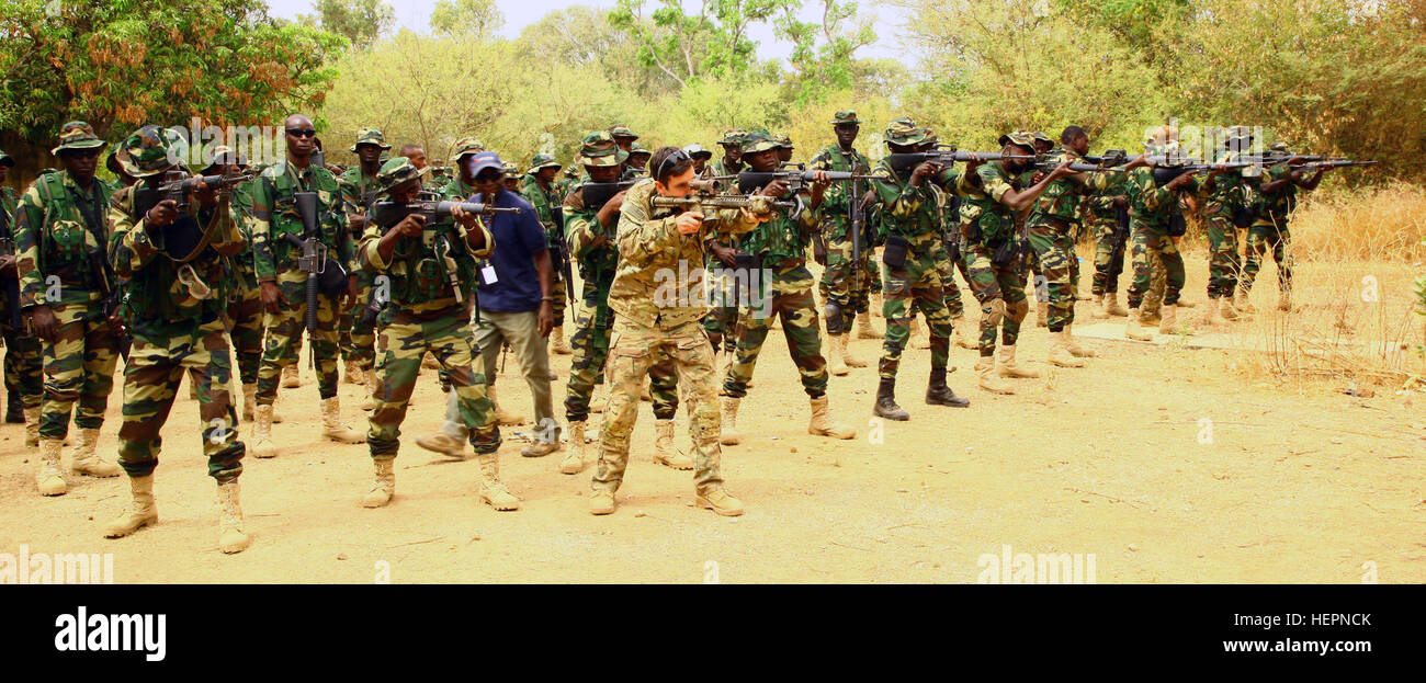A U.S. Army Soldier conducts tactical training with Senegalese military ...