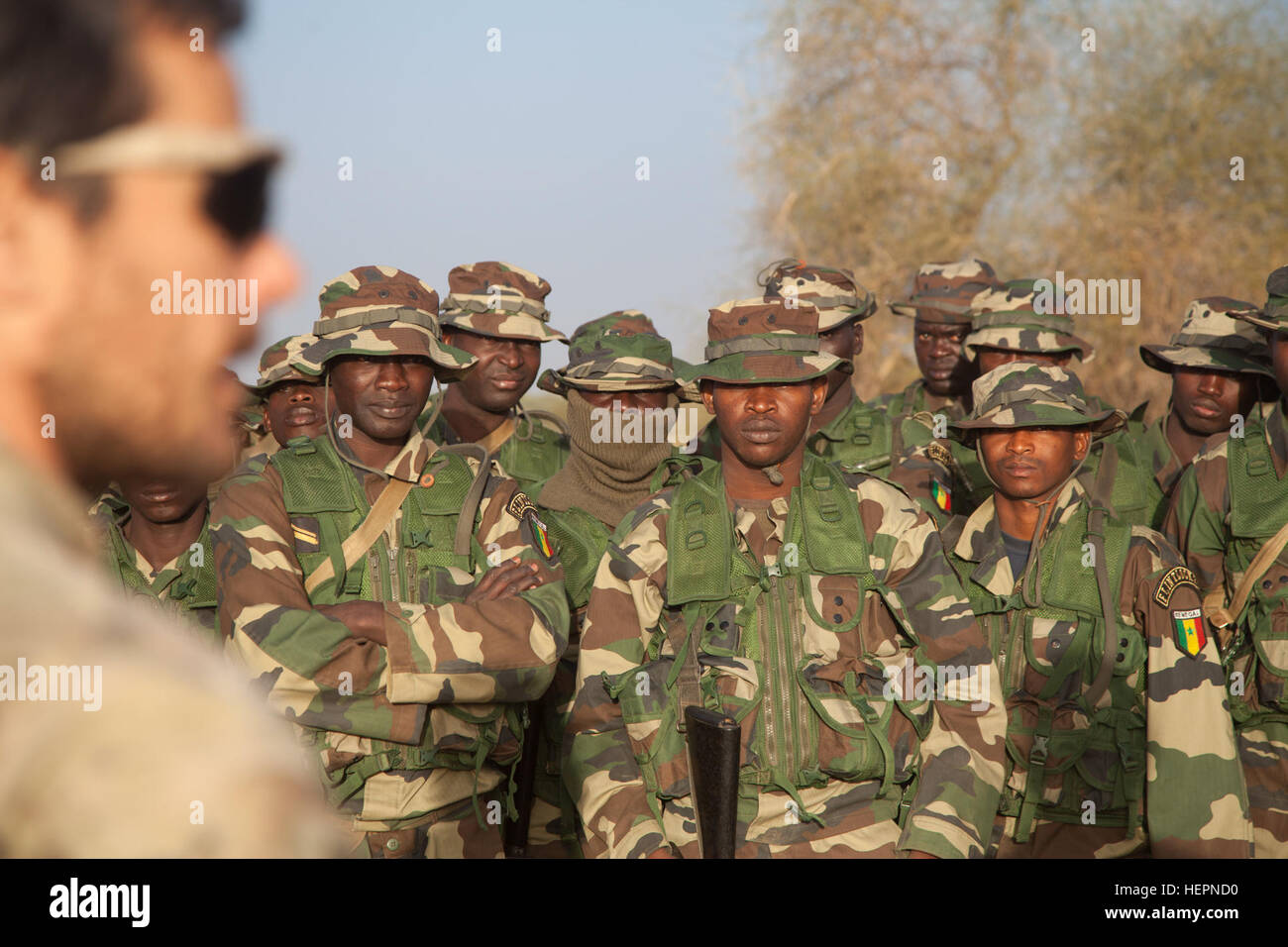 Senegalese Soldiers listen to an Italian Special Forces instructor ...
