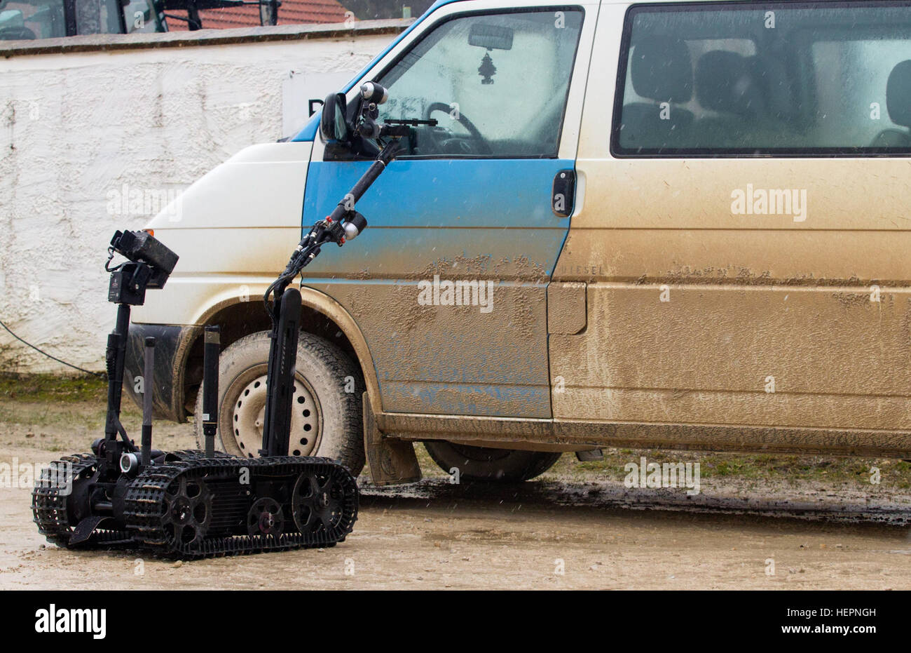 An unmanned robot provides Explosive Ordnance Disposal experts with an ...