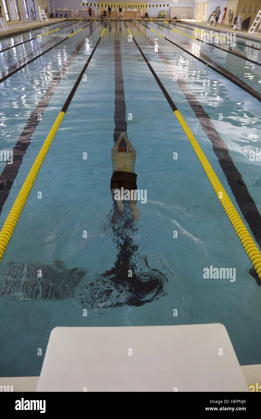 U.S. Army Staff Sgt. (Ret.) Eric Pardo swims laps at the Aquatics ...