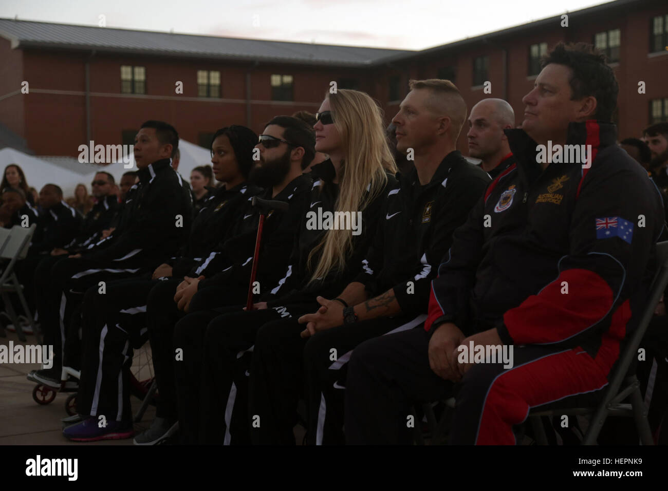 U.S. Army and Australian Defence Force athletes listen to the opening ...