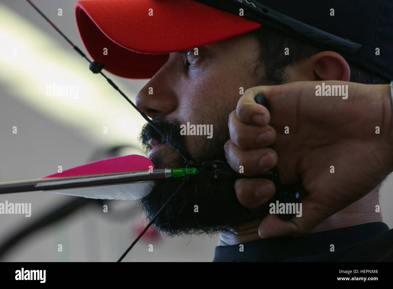 Staff Sgt. (Ret.) Eric Pardo, native of North Bergen, New Jersey, draws ...