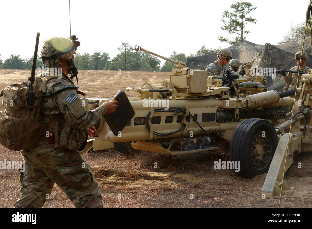 An Airborne Artilleryman assigned to the 82nd Airborne Division ...