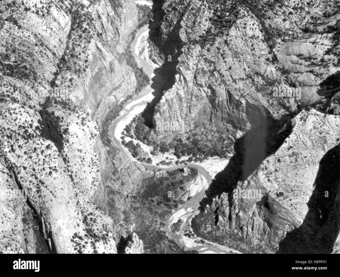 An entrenched river features steep banks and confined channel flow ...