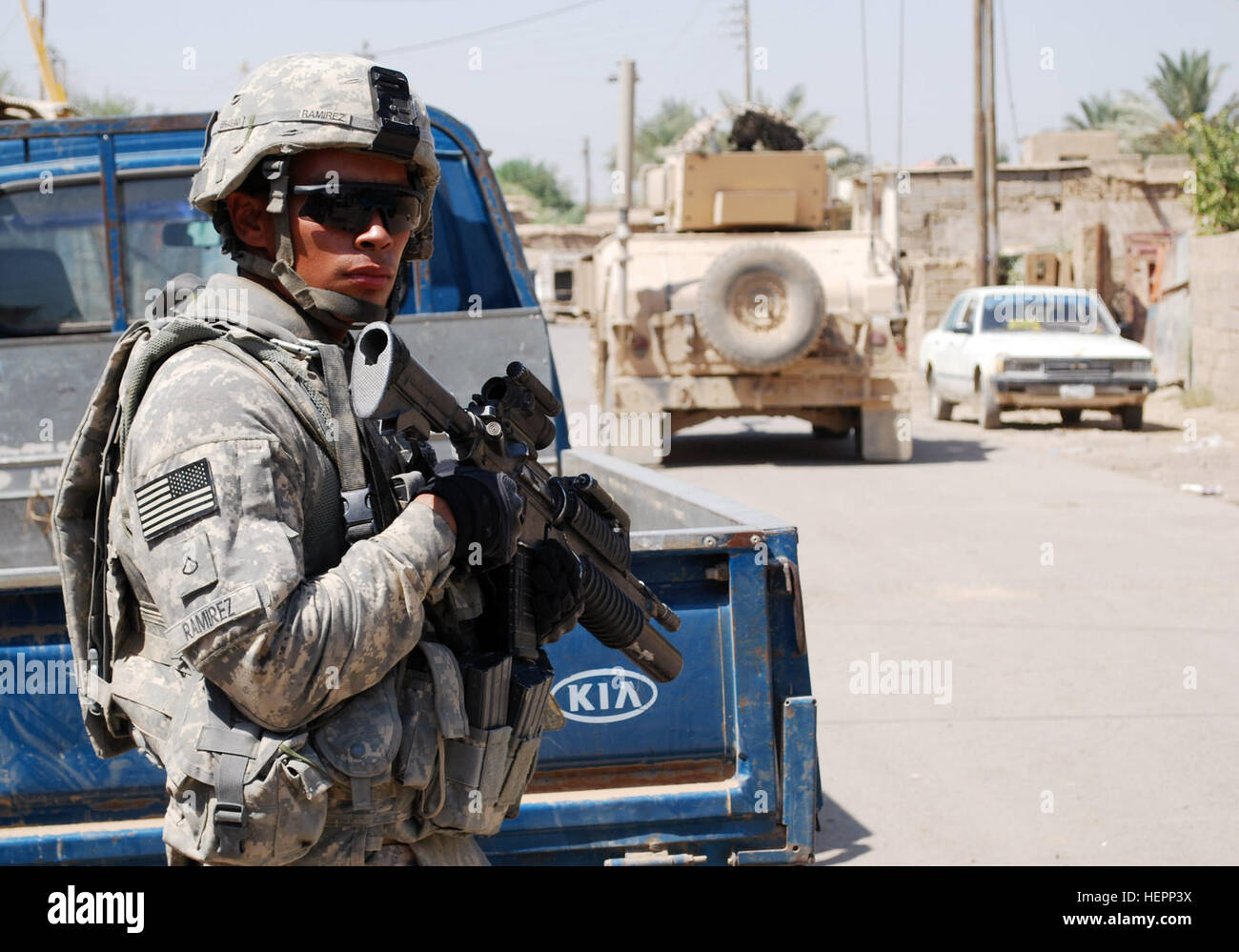 Pfc. Juan Ramirez of Los Angeles checks his surroundings during a ...