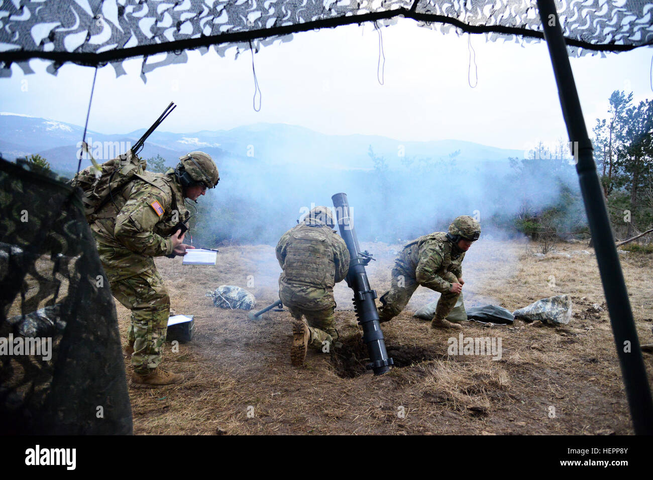U.S. Army mortarmen assigned to 2nd Battalion, 503rd Infantry Regiment ...