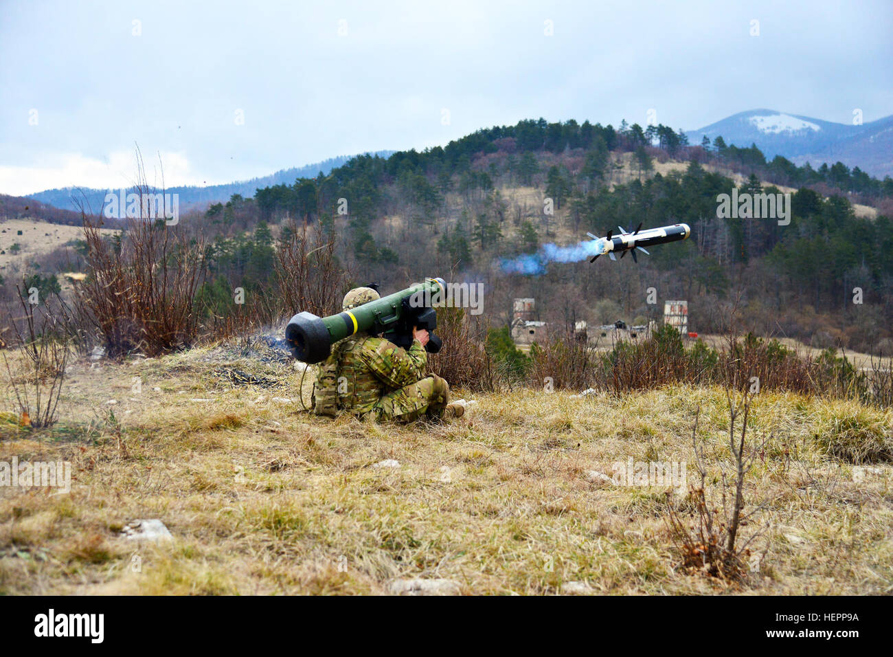 A U.S. Army paratrooper fires a Javelin anti-tank missile during ...