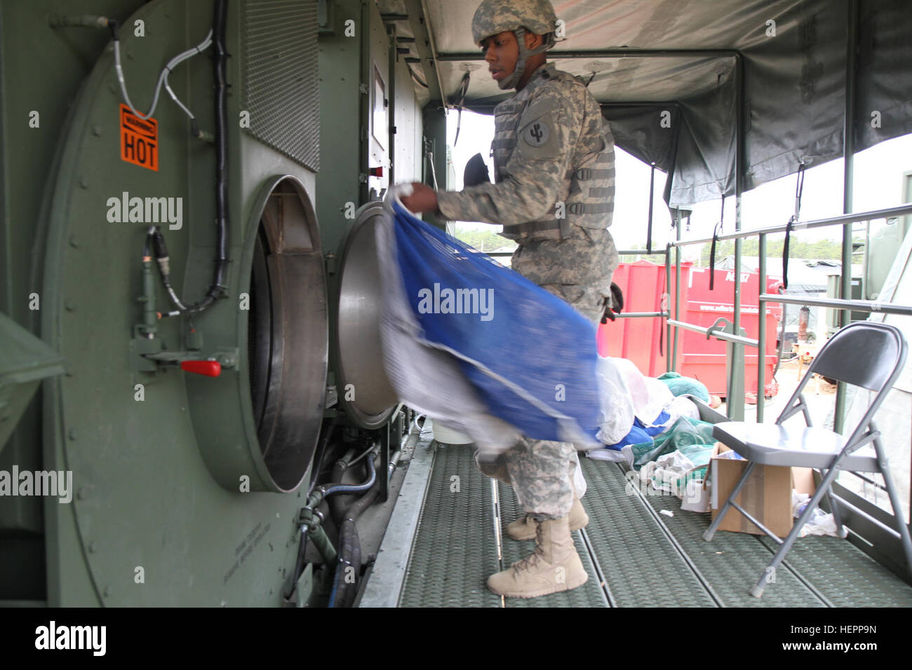 Soldiers from the 1008th Quartermaster Company operate Laundry Advanced ...