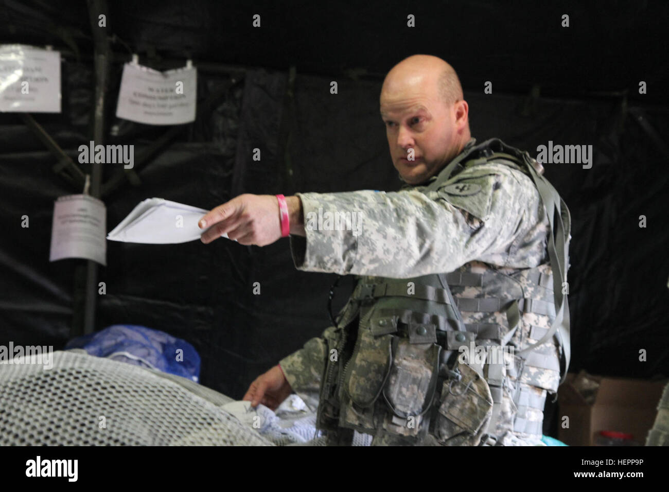 U.S. Army Sgt. James Peterson, a shower/laundry and clothing repair ...