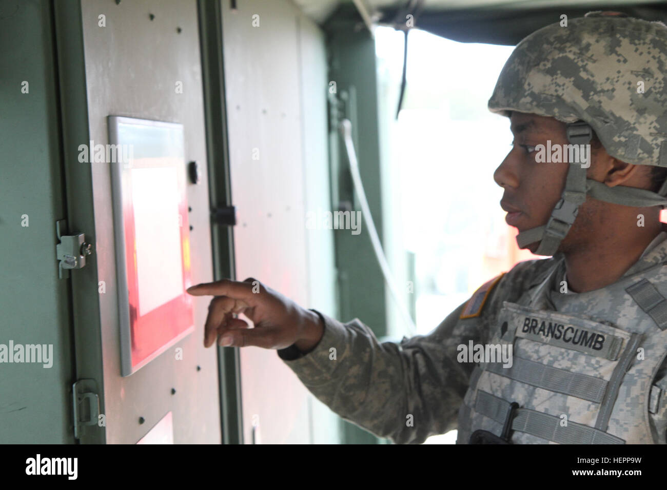 U.S. Army Spc. Devon Branscumb, a shower/laundry and clothing repair ...