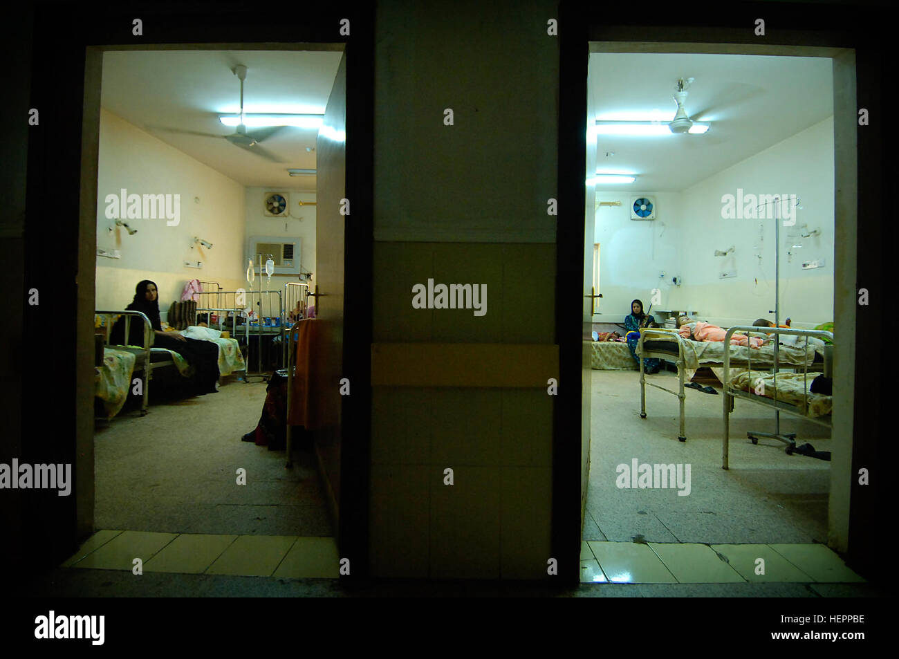 Iraqi mothers sit in in-patient rooms with their newborn children at ...