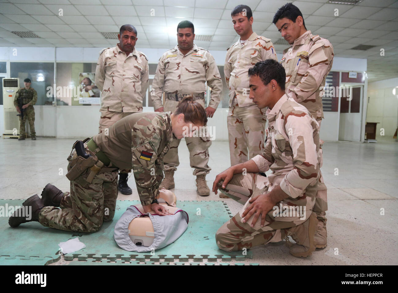A British soldier assigned to the Royal Army Medical Corps, demonstrate ...