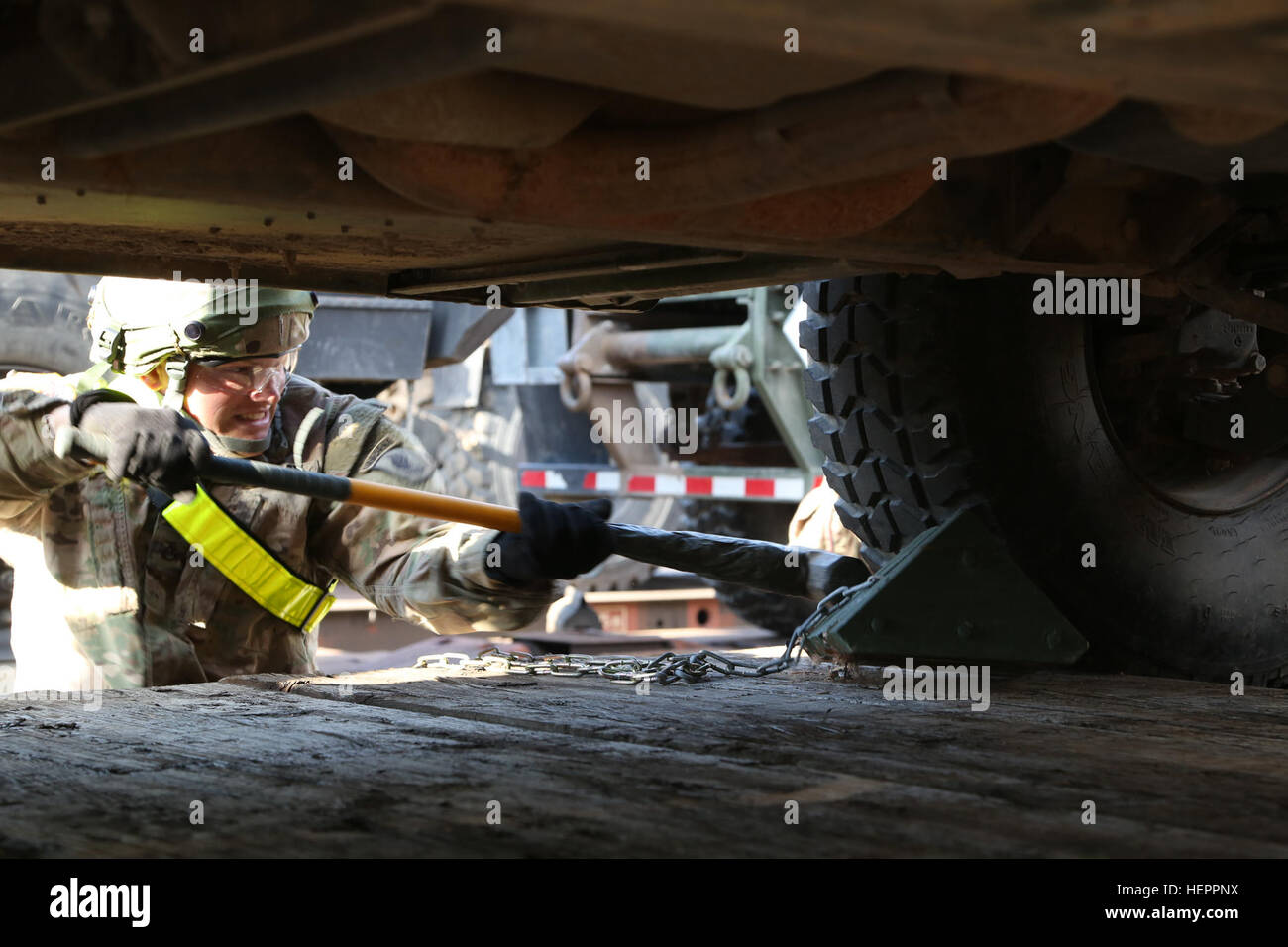 A U.S. Soldier of 173rd Airborne Brigade removes a chalk block from ...