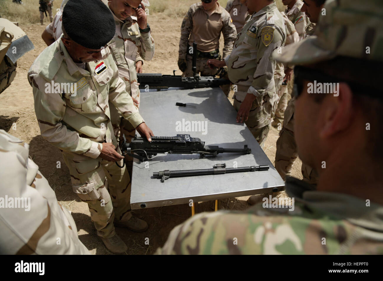 An Iraqi soldier with the 35th Iraqi Army Brigade practices ...