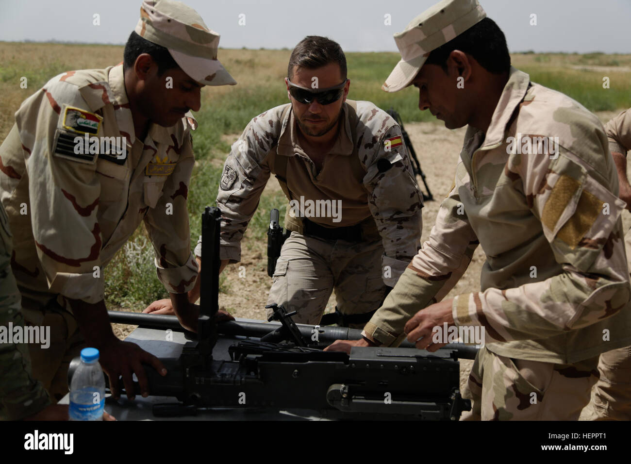 Iraqi soldiers with the 35th Iraqi Army Brigade practice reassembling ...