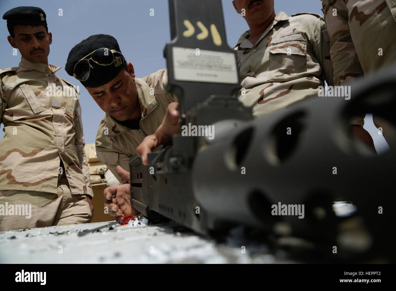 An Iraqi soldier with the 35th Iraqi Army Brigade practices ...