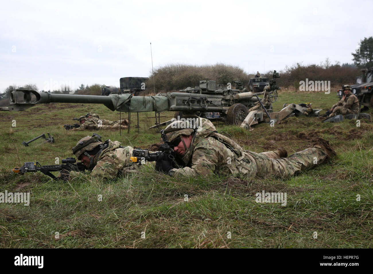 U.S. Soldiers of 4th Battalion, 319th Airborne Field Artillery Regiment, 173rd Airborne Brigade ...