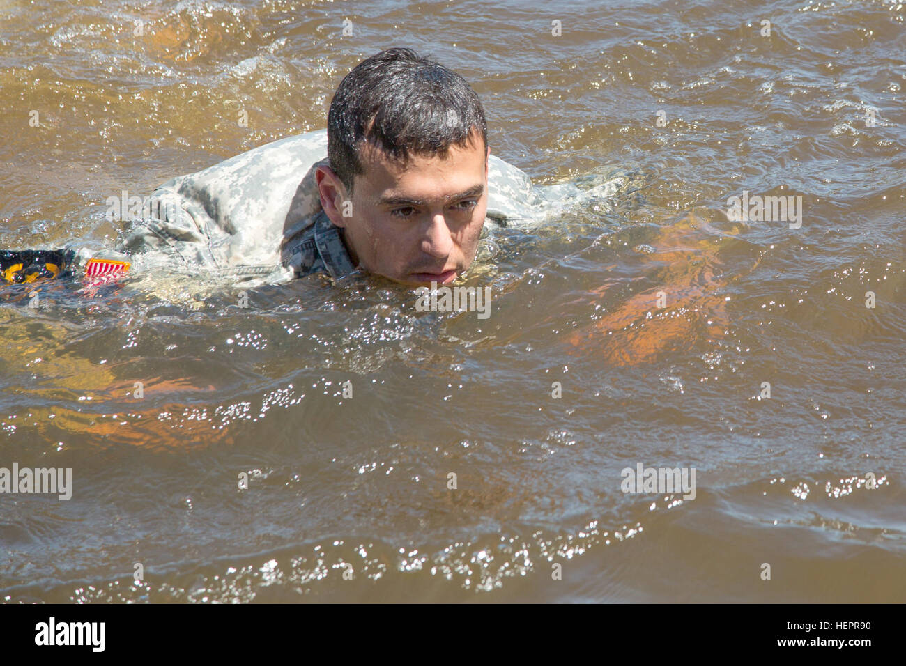 A U.S. Army Ranger swims in Victory Pond during the Best Ranger ...