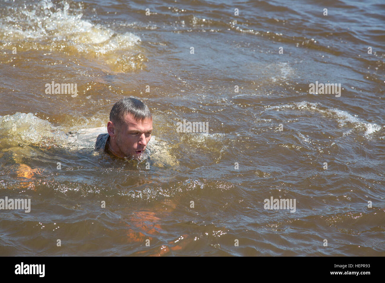 A U.S. Army Ranger swims in Victory Pond during the Best Ranger ...