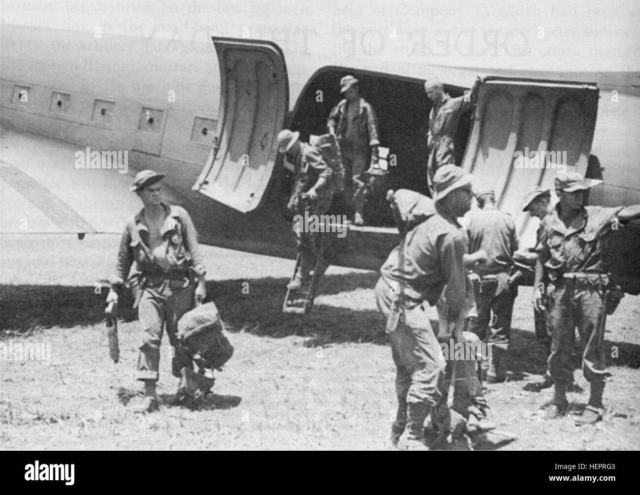DOBODURA AIRSTRIP. 41st Division troops arriving from Port Moresby, 4 ...