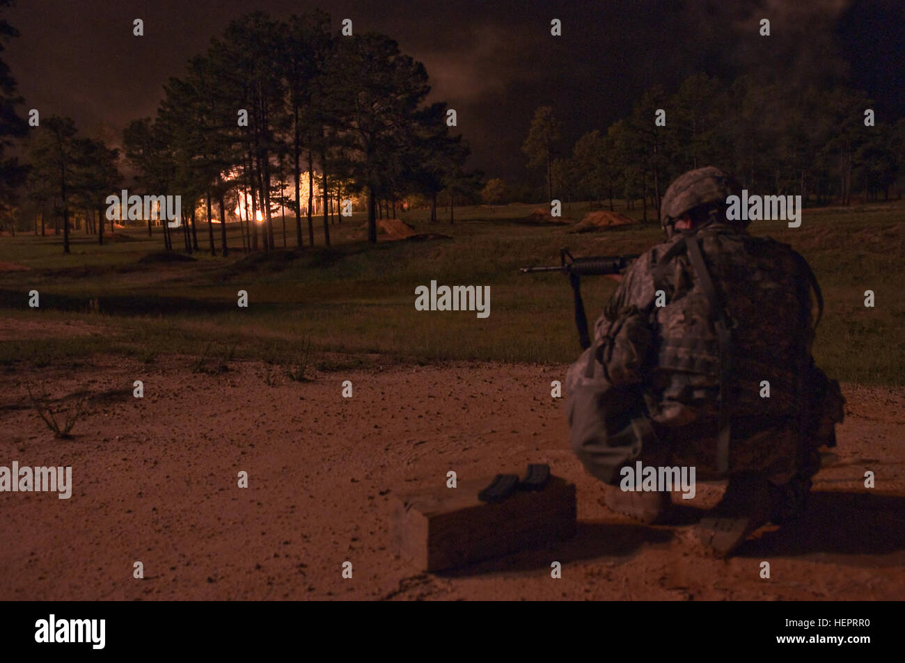 Spc. Michael Orozco of the 416th Engineering Command (Theater) engages ...