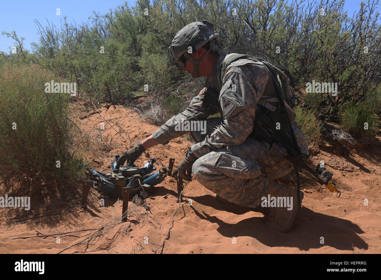 U.S. Army Pfc. Eric Groom, a Combat Engineer, assigned to the 40th ...