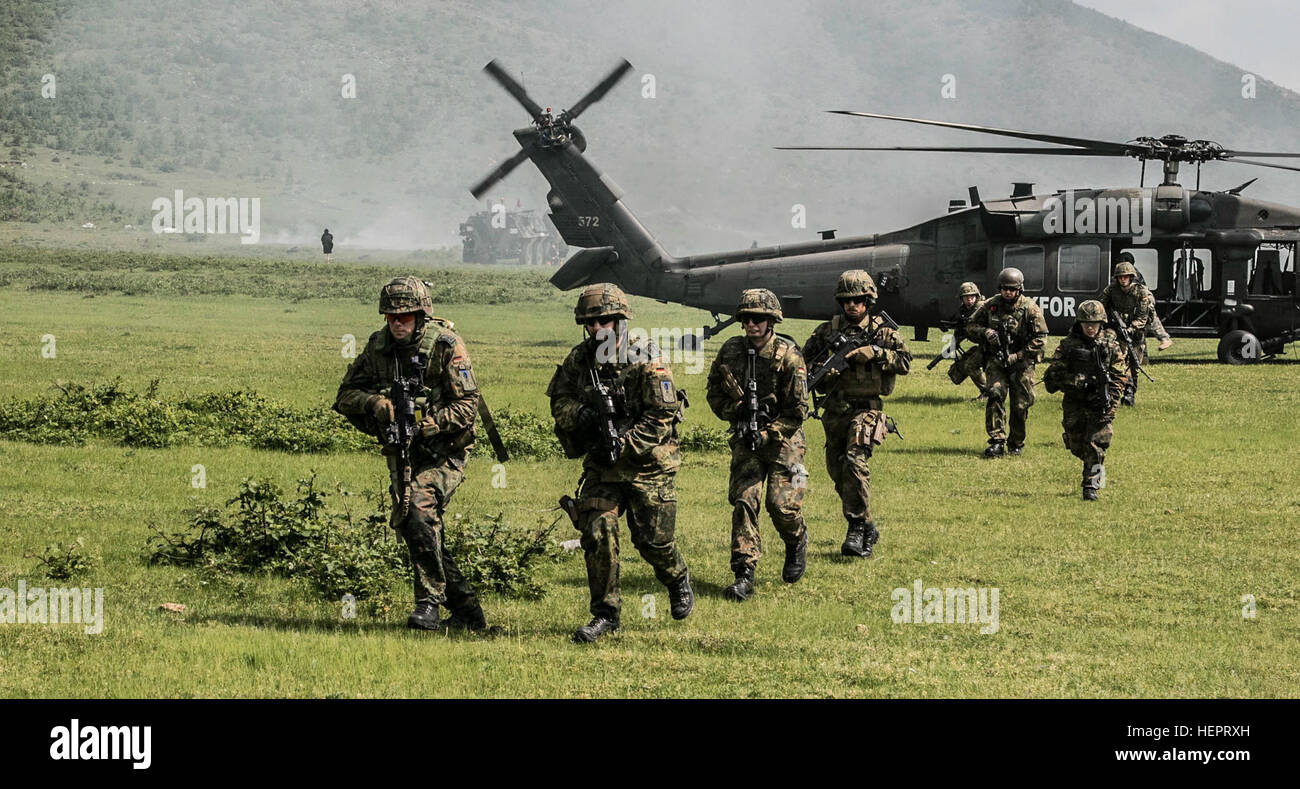 German soldiers from Multinational Battle Group-East conducted an air ...