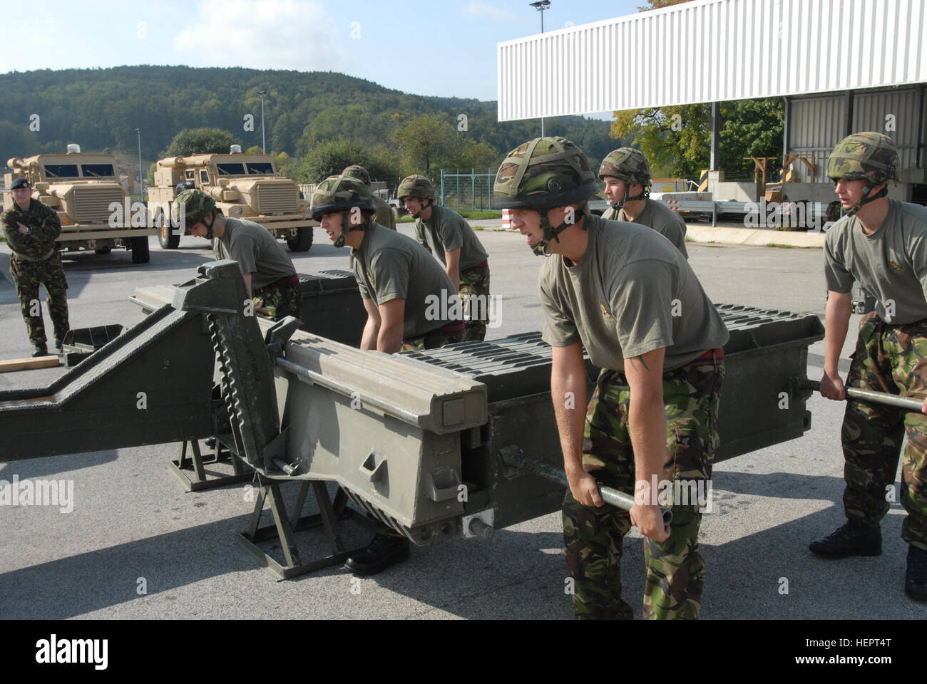 Soldiers with 3 Troop, 11 Field Squadron, Royal Engineers lifts pieces ...