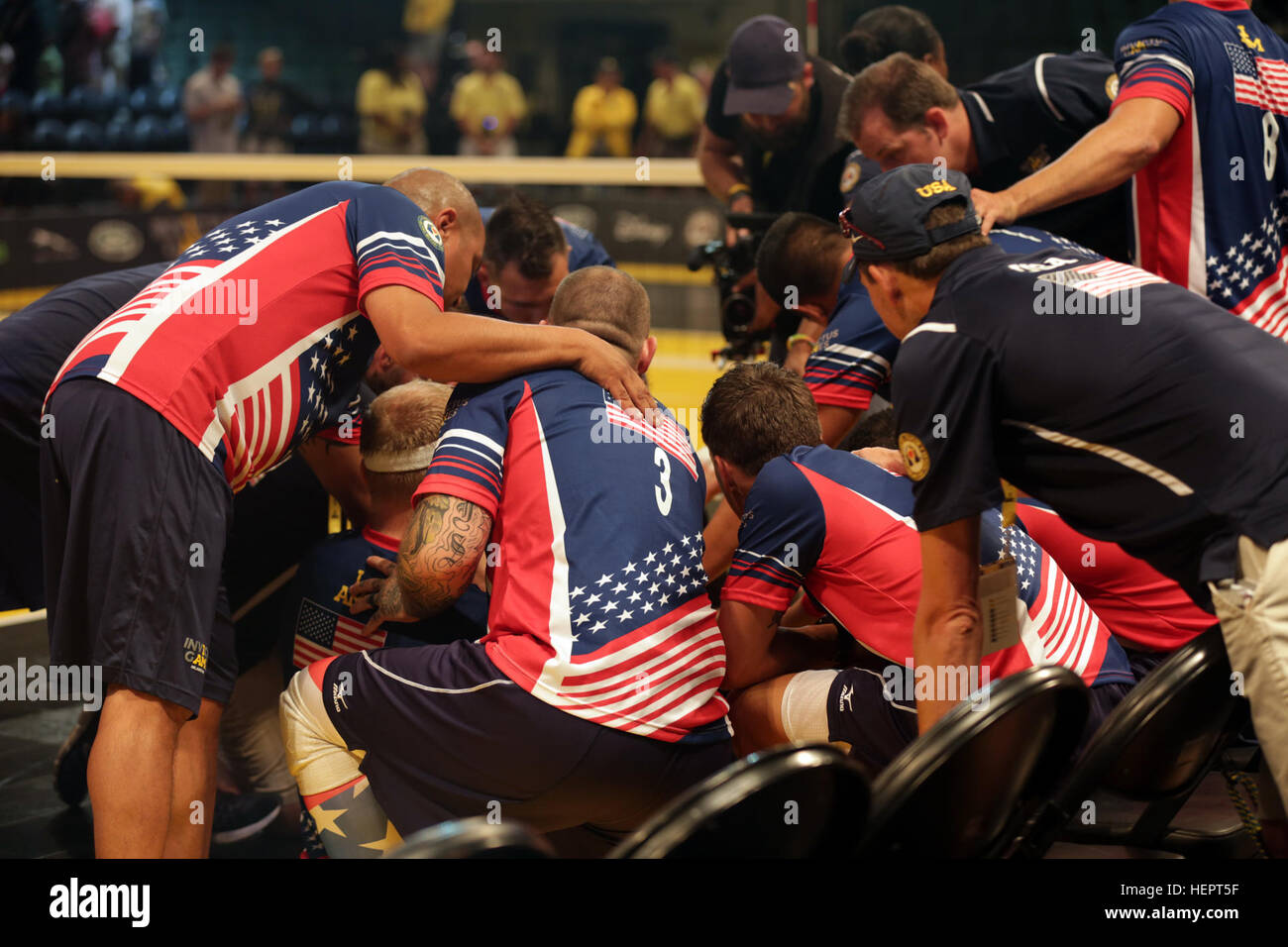 The United States team for sitting volleyball celebrates after winning ...