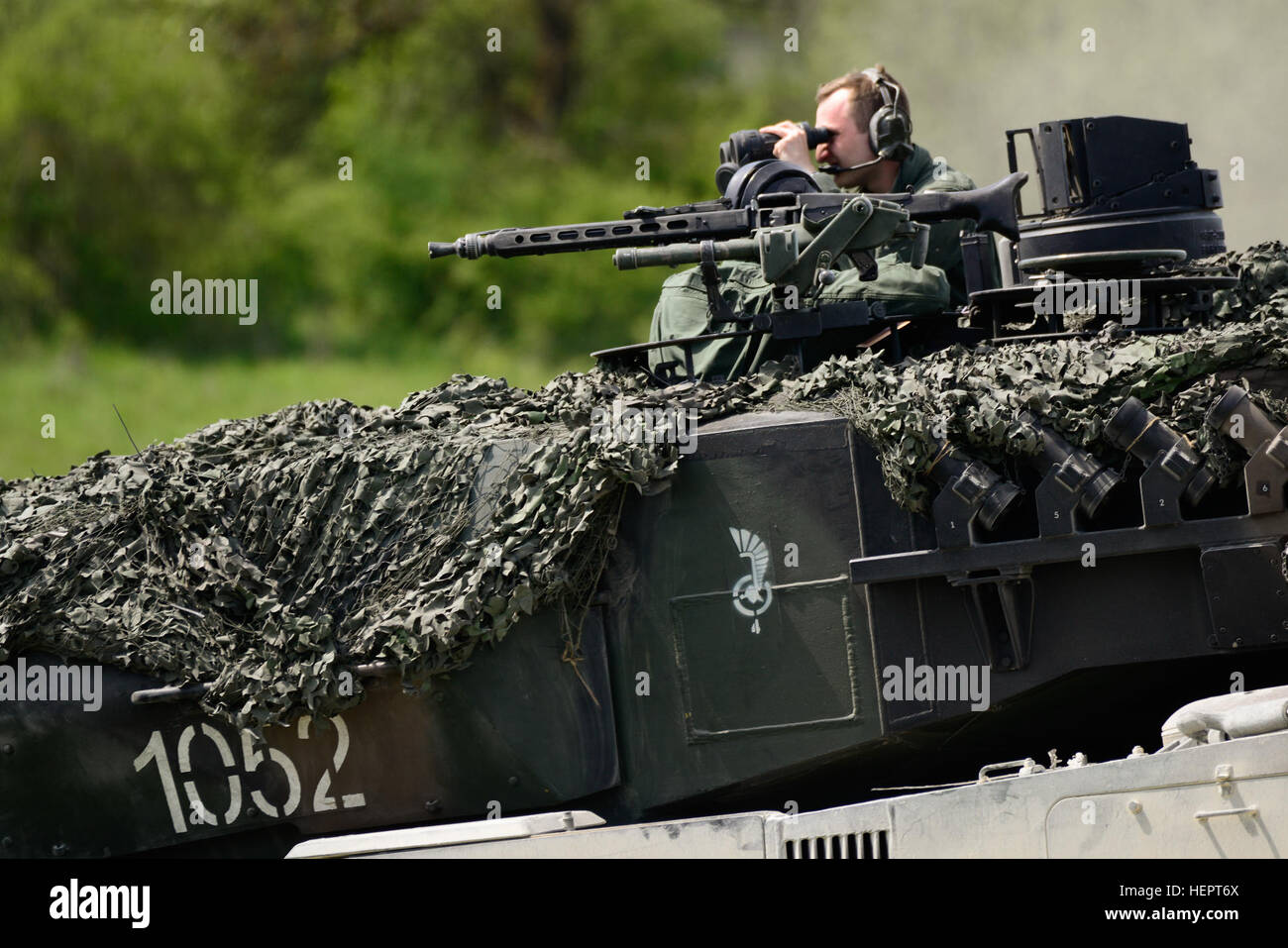 A Polish soldier, assigned to the 34th Armor Cavalry Brigade, conducts ...