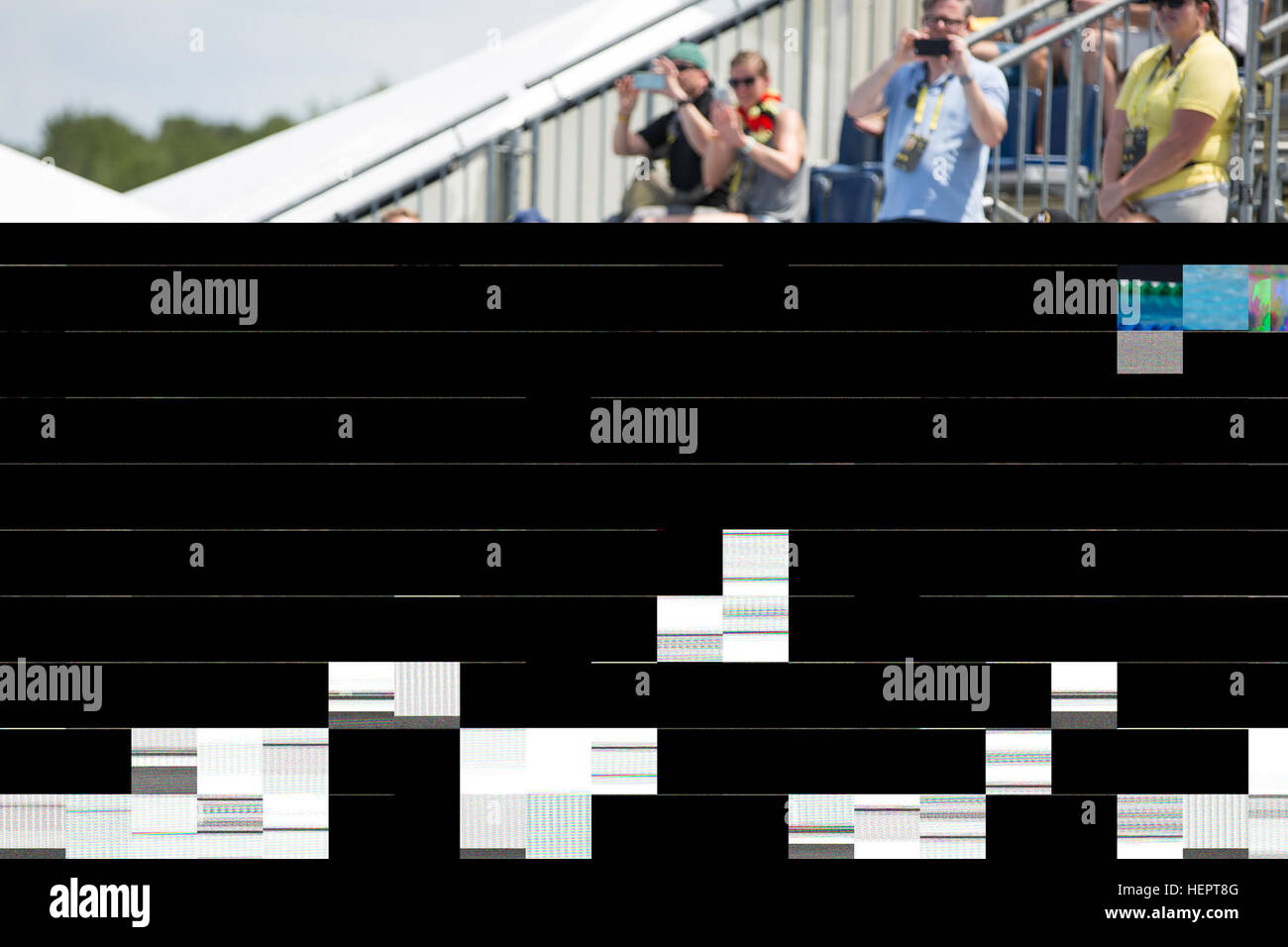 Prince Harry kisses Elizabeth Marks, United States, after he awards her ...