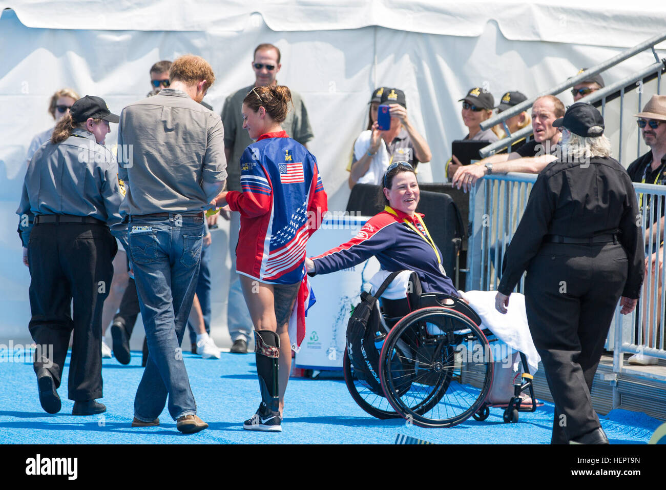 Elizabeth Marks, United States gives Prince Harry her medal after the ...