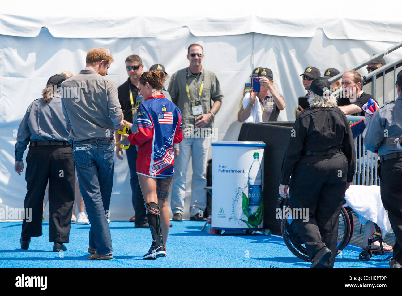 Elizabeth Marks, United States gives Prince Harry her medal after the ...