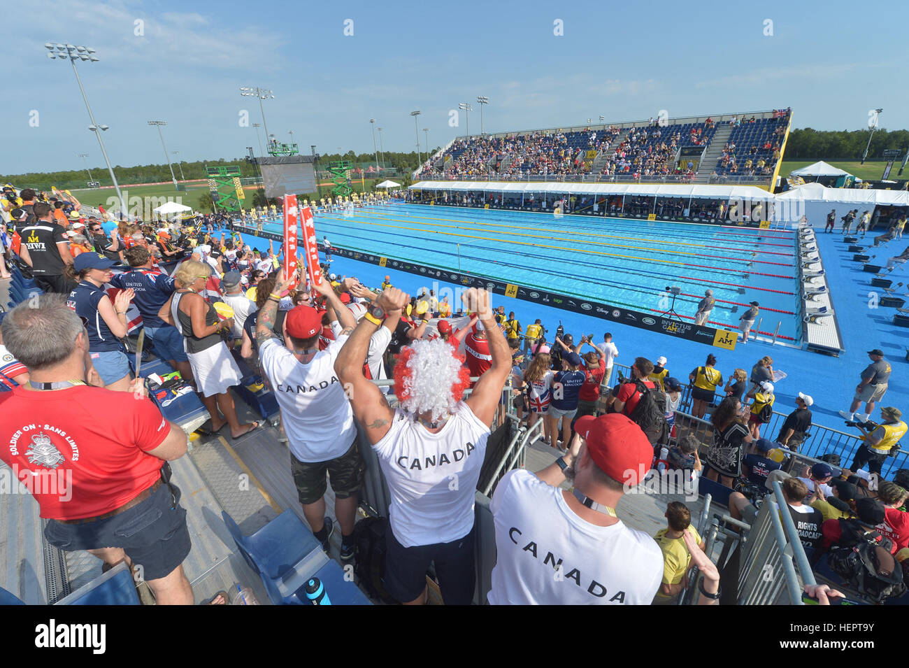Spectators cheer during the swimming finals of the 2016 Invictus Games ...