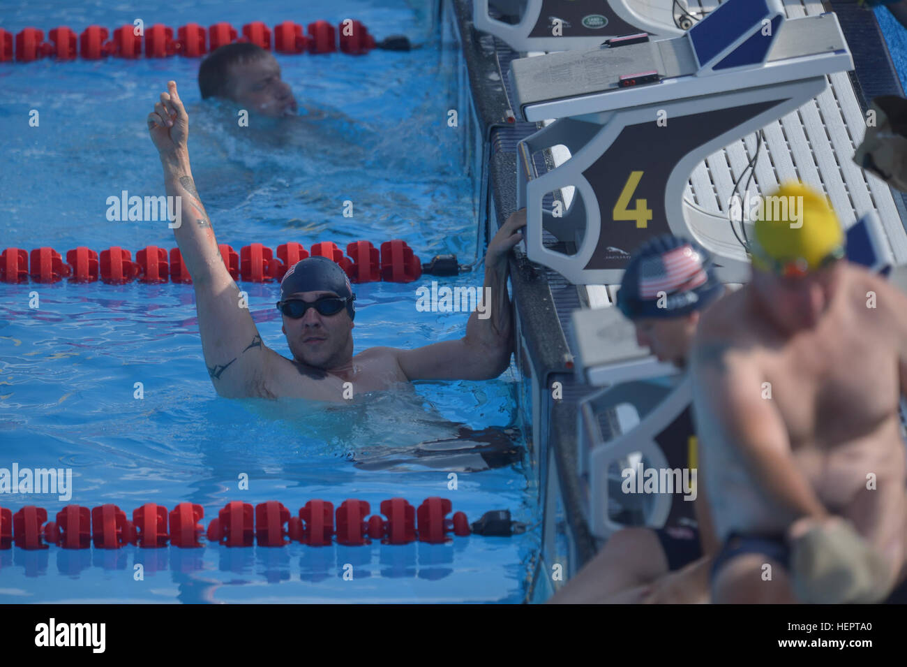 U.S. Air Force Master Sgt. Jesse Graham competes swimming finals of the ...