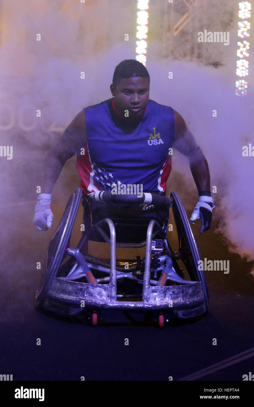 U.S. Army Veteran Ryan Major enters the arena at the begining of the ...