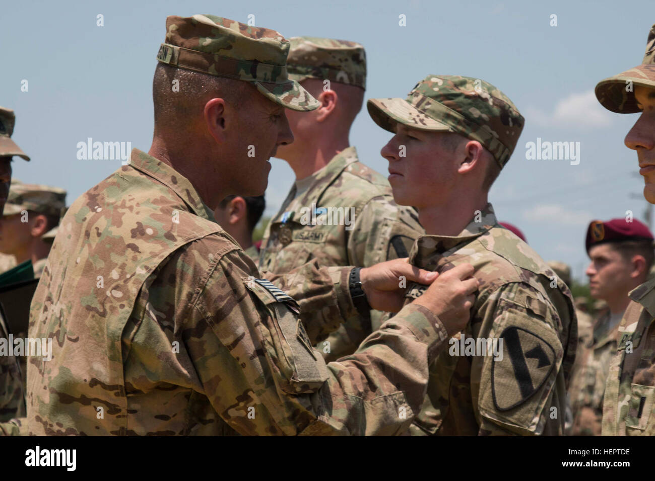 First Team Commanding General Maj. Gen. John Thomson pins the Expert ...