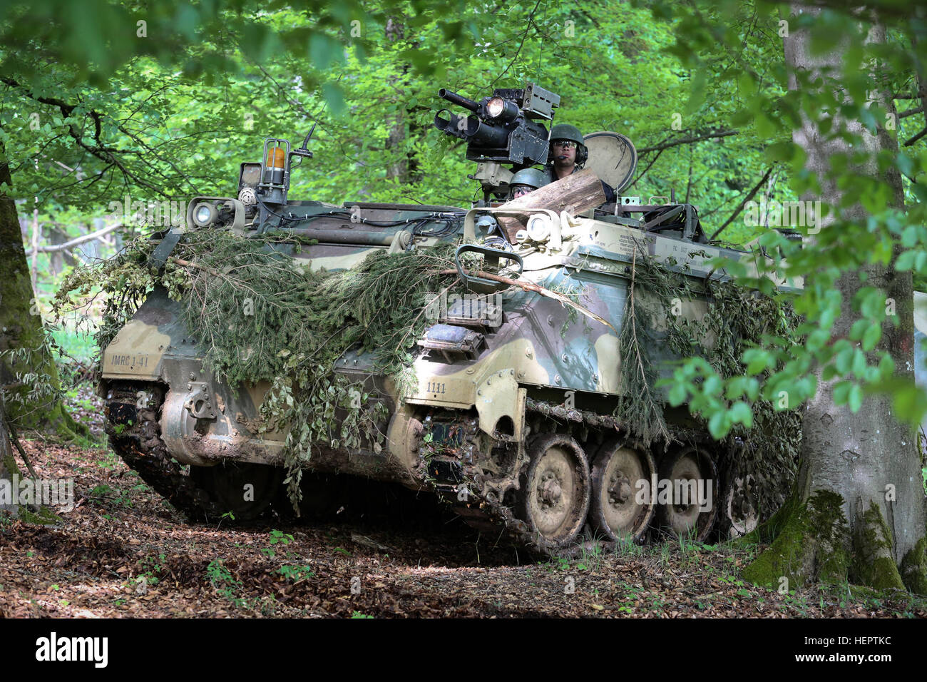 U.S. Soldiers of 1st Battalion, 4th Infantry Regiment scan their sector ...