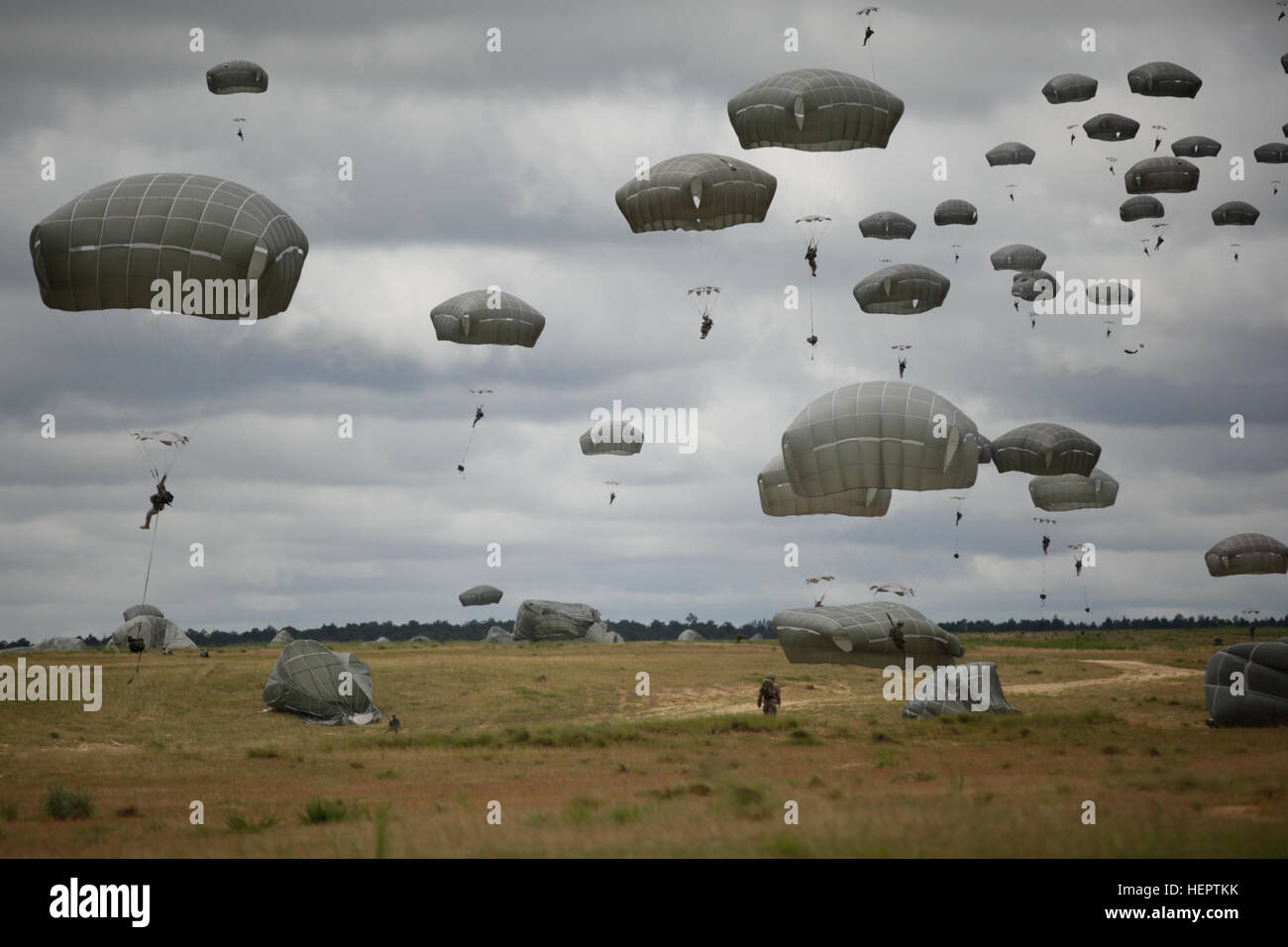 U.S. Army Paratroopers perform a static line jump during the Saturday ...