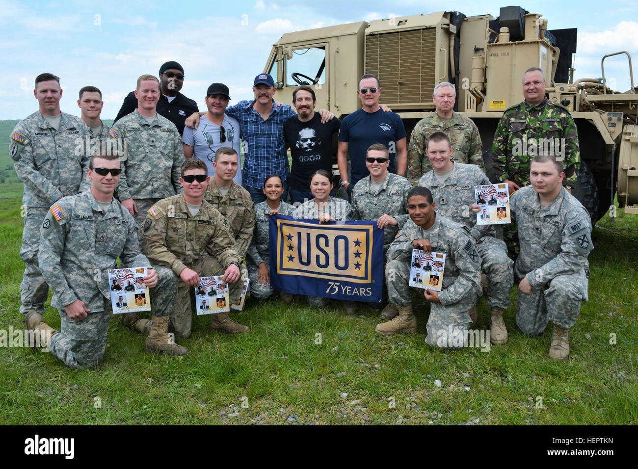 U.S. and Romanian military leaders attend a USO show with Romanian Land ...