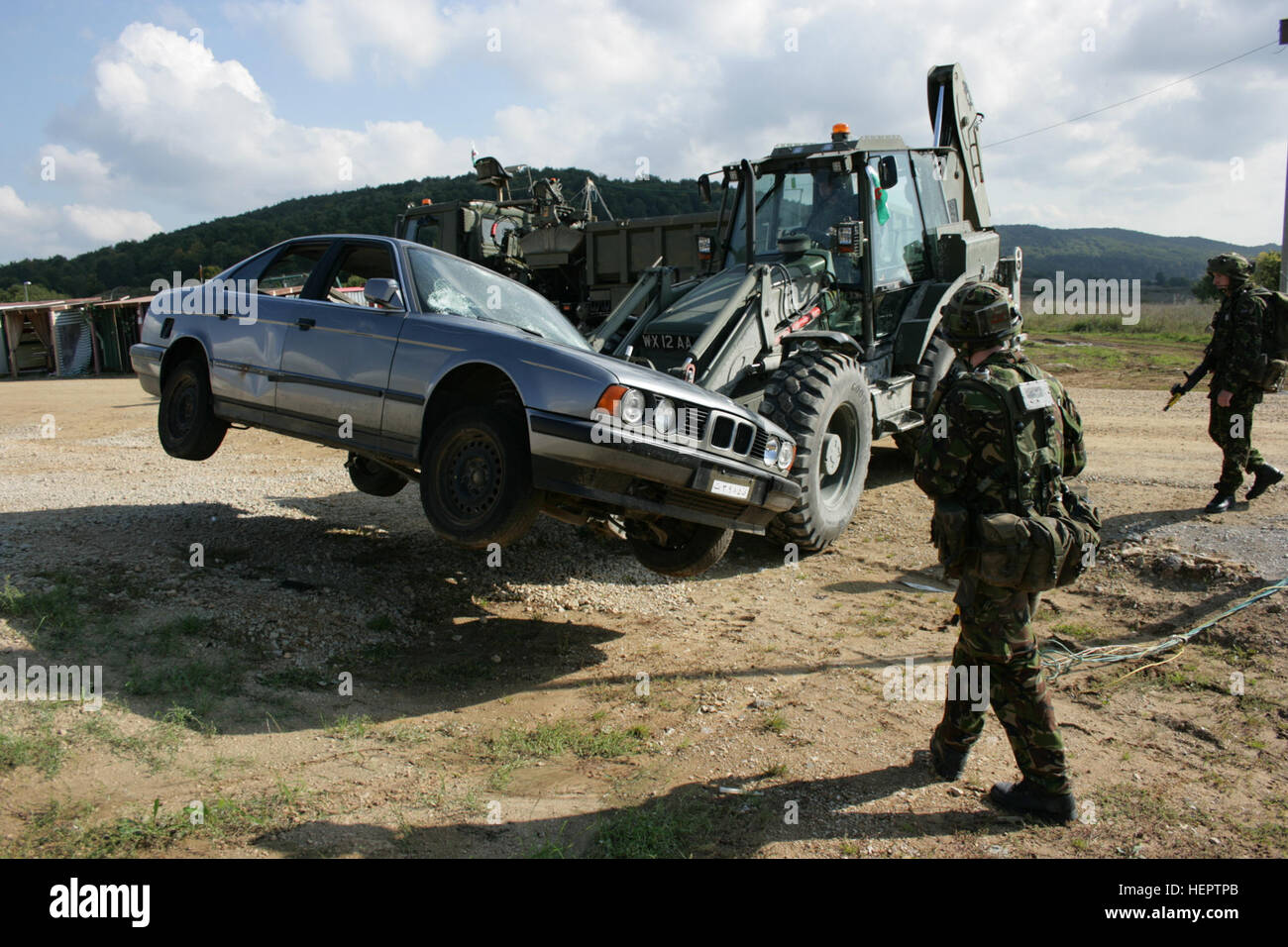 Soldiers from 1st Battalion Welsh Guards use a Light Wheeled Tractor to ...