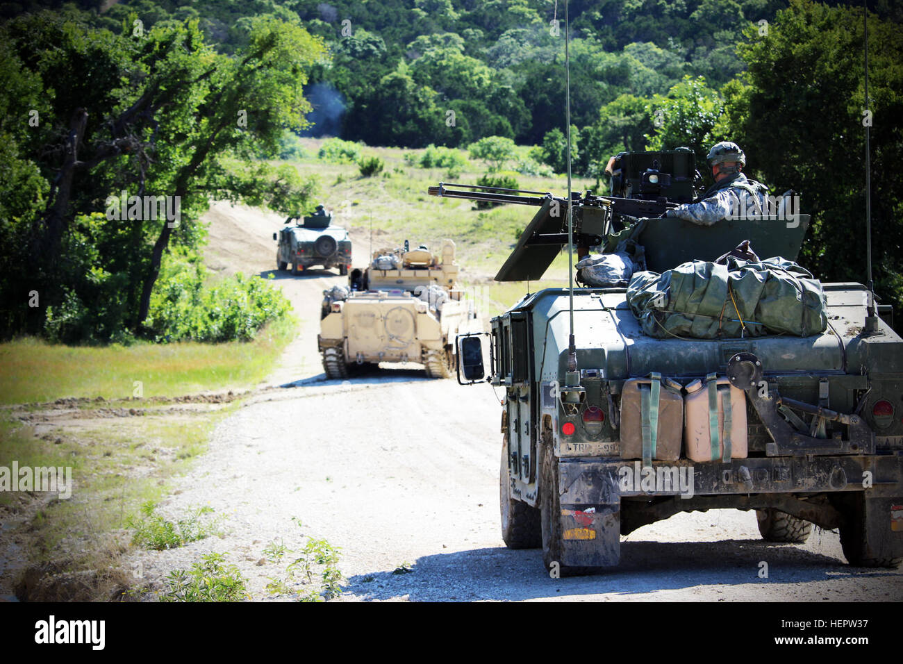 155th Armored Brigade Combat Team Soldiers conduct a zone recon during ...