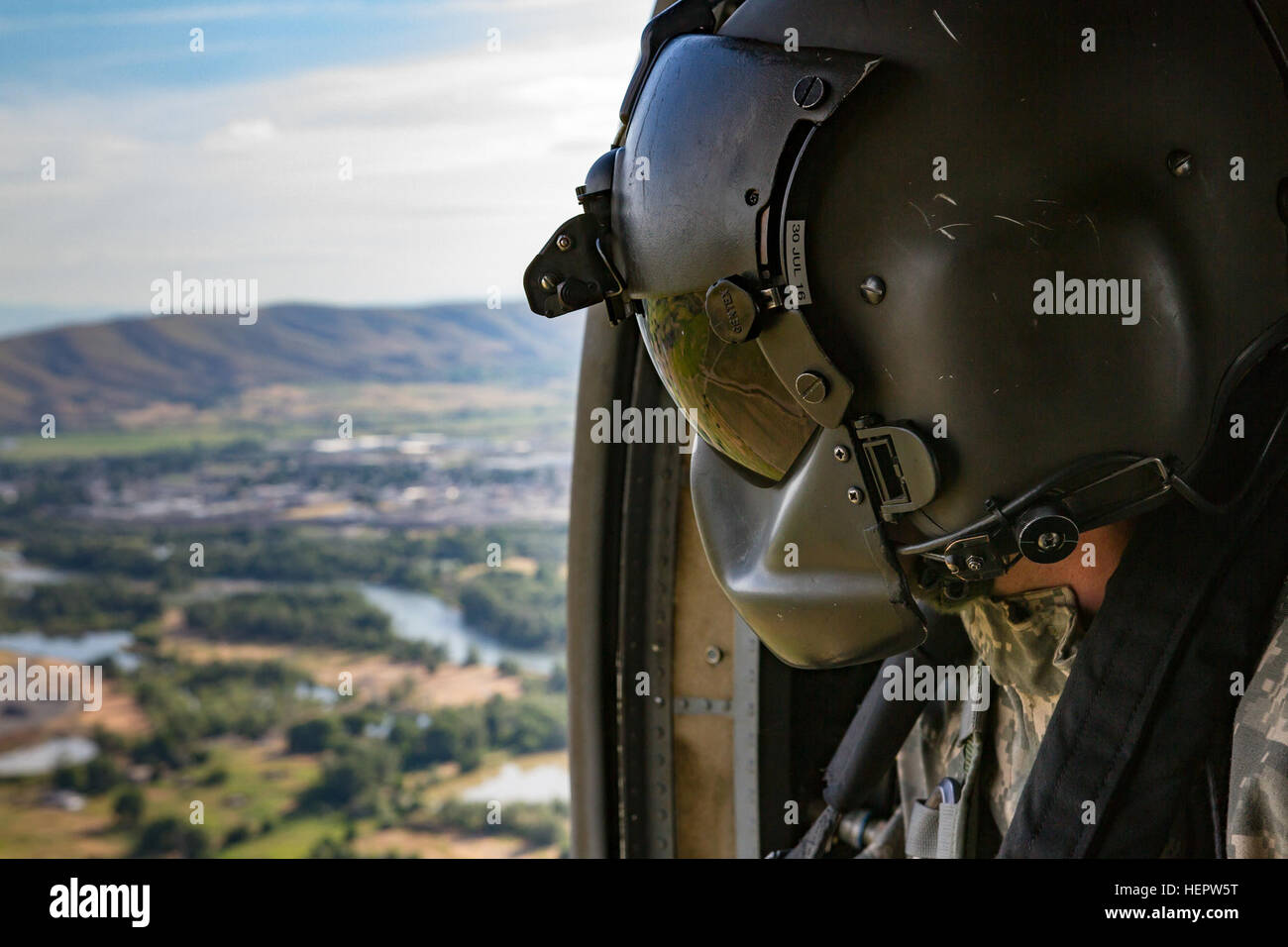 A U.S. Army HH-60 Black Hawk helicopter crew chief, assigned to U.S ...