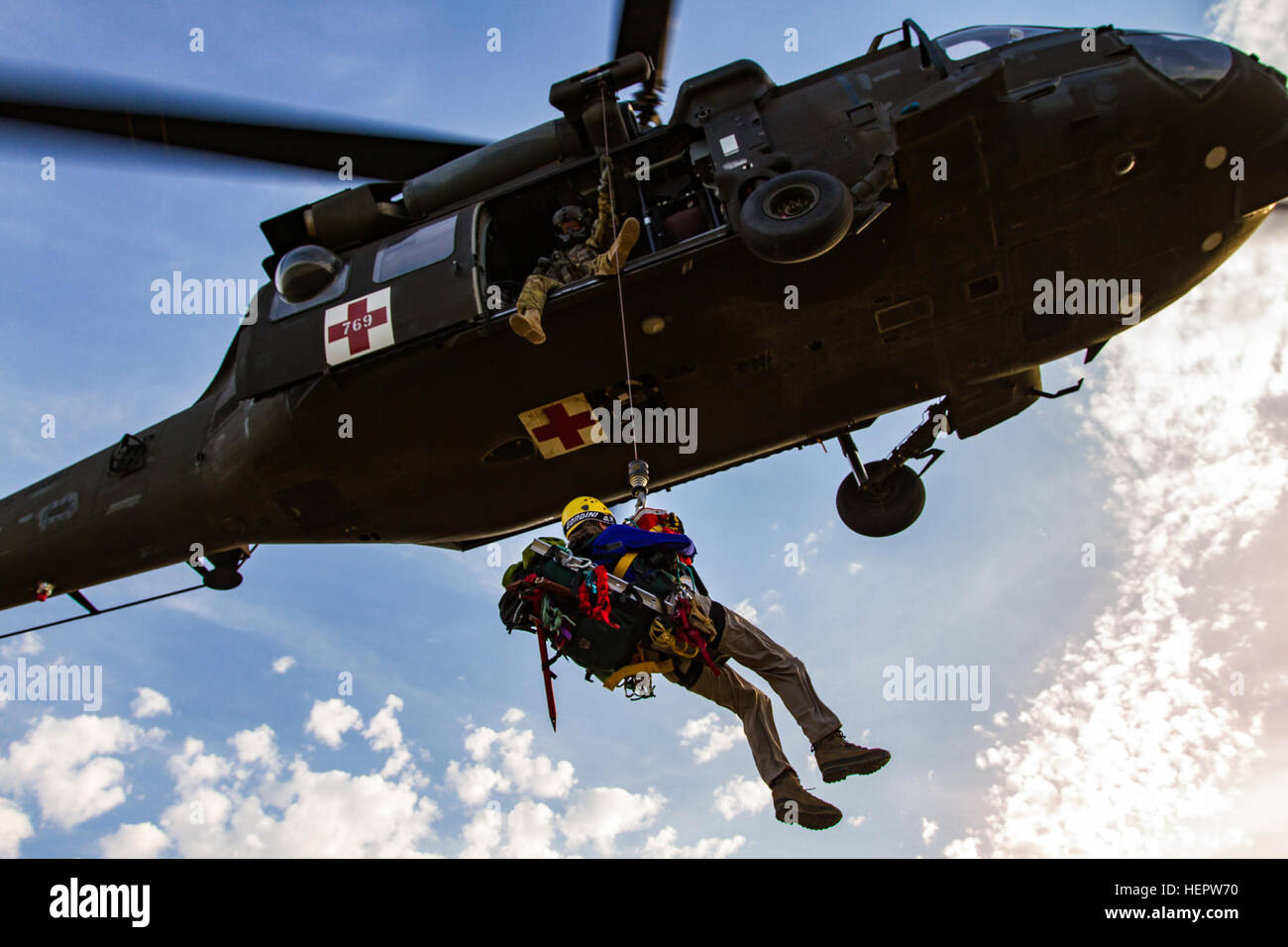 A U.S. Army HH-60 Black Hawk helicopter crew chief, assigned to U.S ...