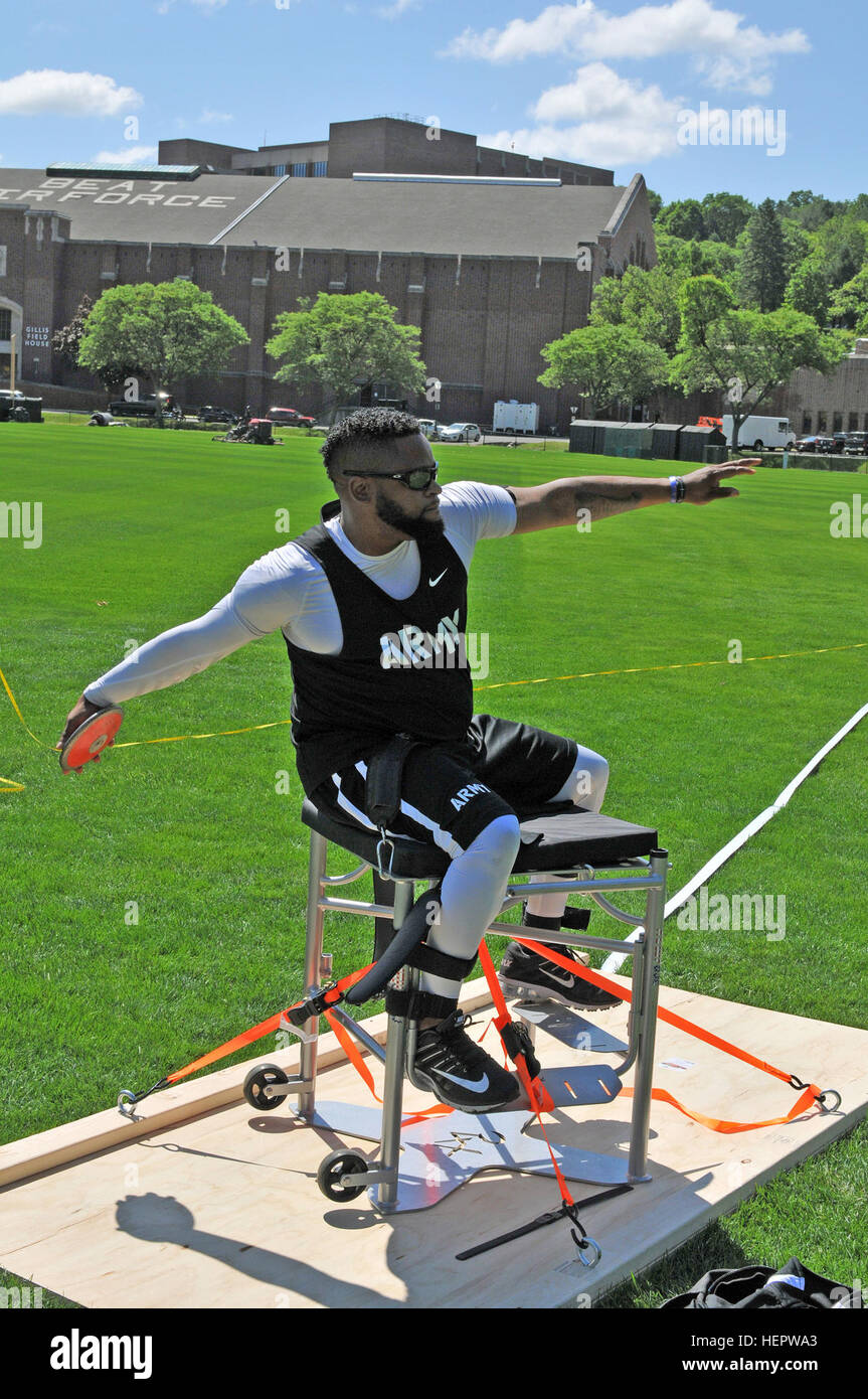 U.S. Army Veteran Staff Sgt. Robert Green practices seated discus ...