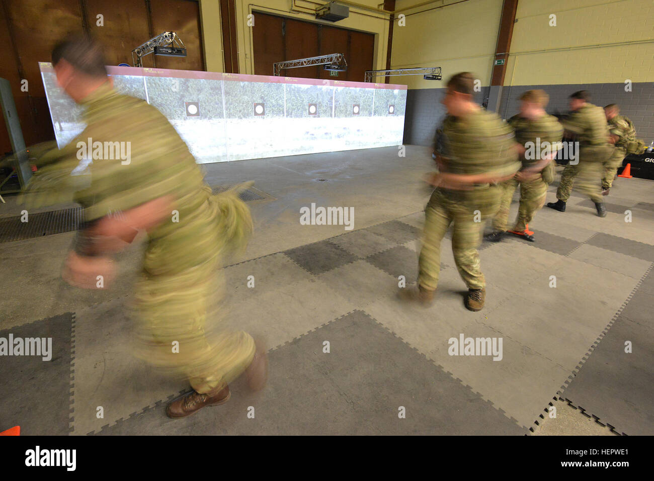 British soldiers practice marksmanship at the Gunfighter Gymnasium in ...
