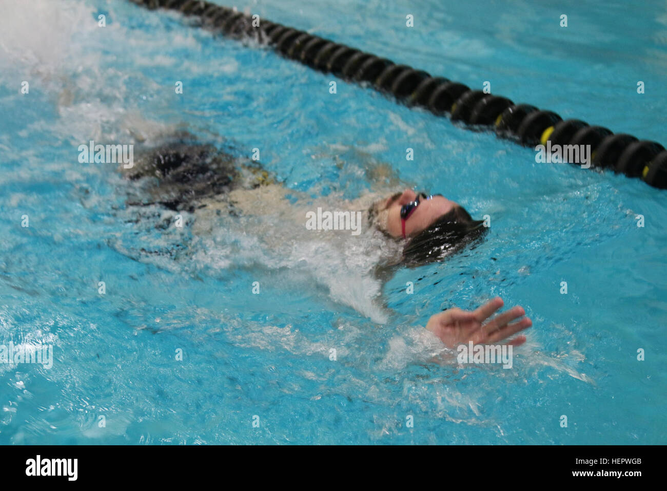 Navy Veteran Ryan Shannon of Morris, Ill., practices in the swimming ...