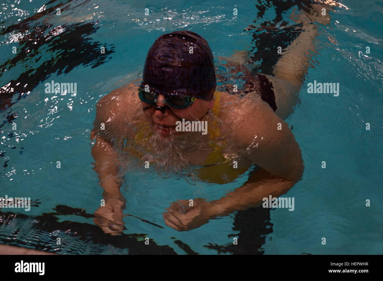 Navy veteran Katie Ray, of Winchester, Ky., emerges from the water in ...