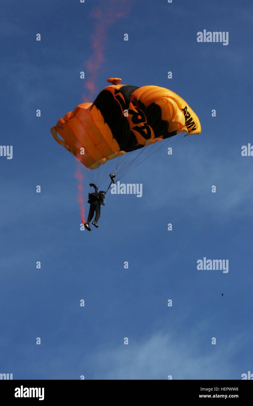 A Soldier from the U.S. Army Golden Knights, parachutes into the ...